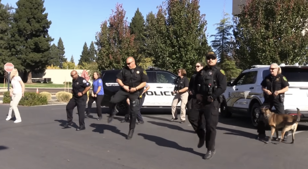 The Police Line Up To Do A Dance Routine, But Wait Till You See The Dog